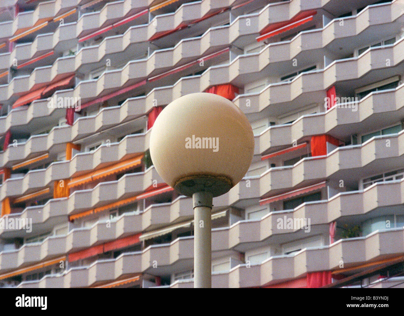 Street lamp in front of a high-rise apartment block Stock Photo - Alamy