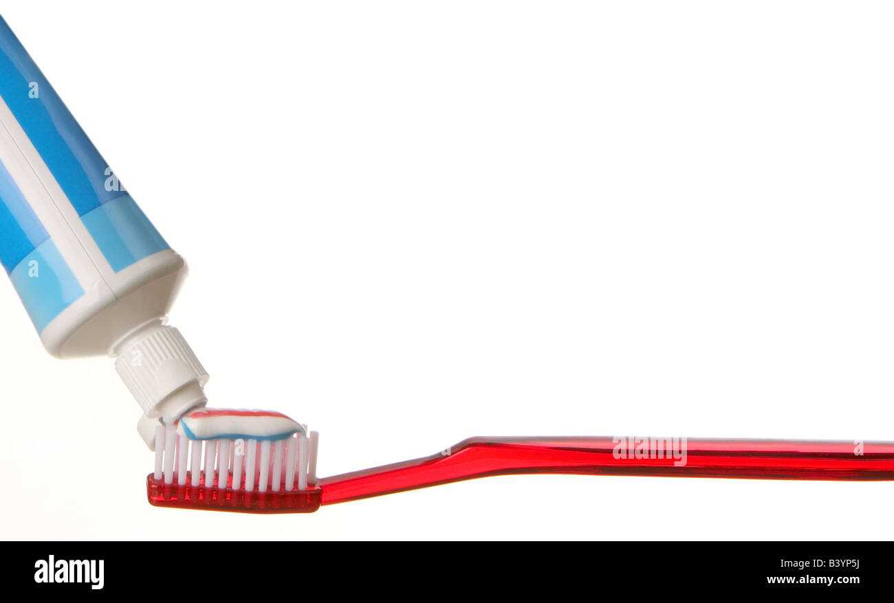 toothpaste tube and toothbrush Stock Photo - Alamy