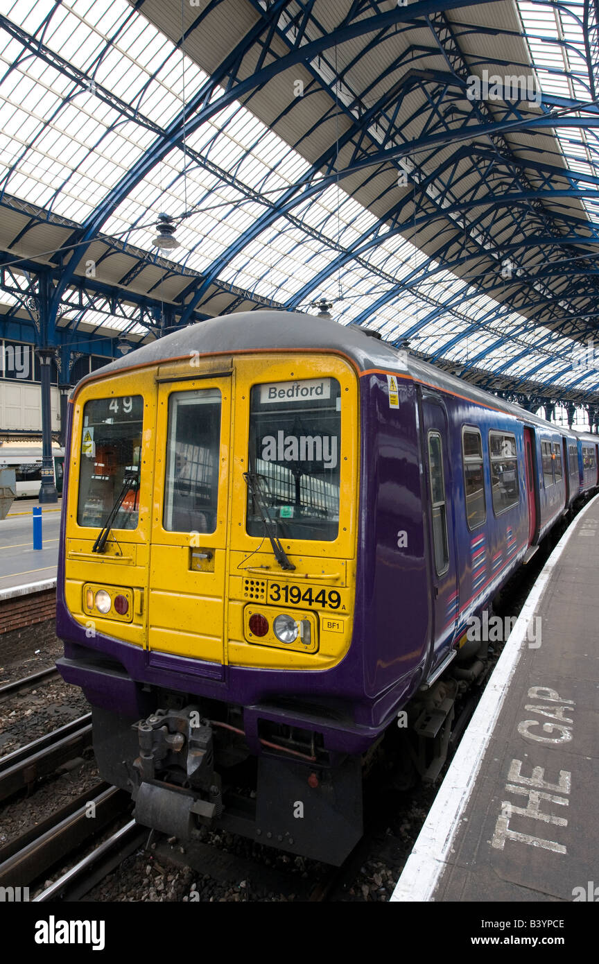 Class 319 train in first capital connect livery waiting at a platform ...
