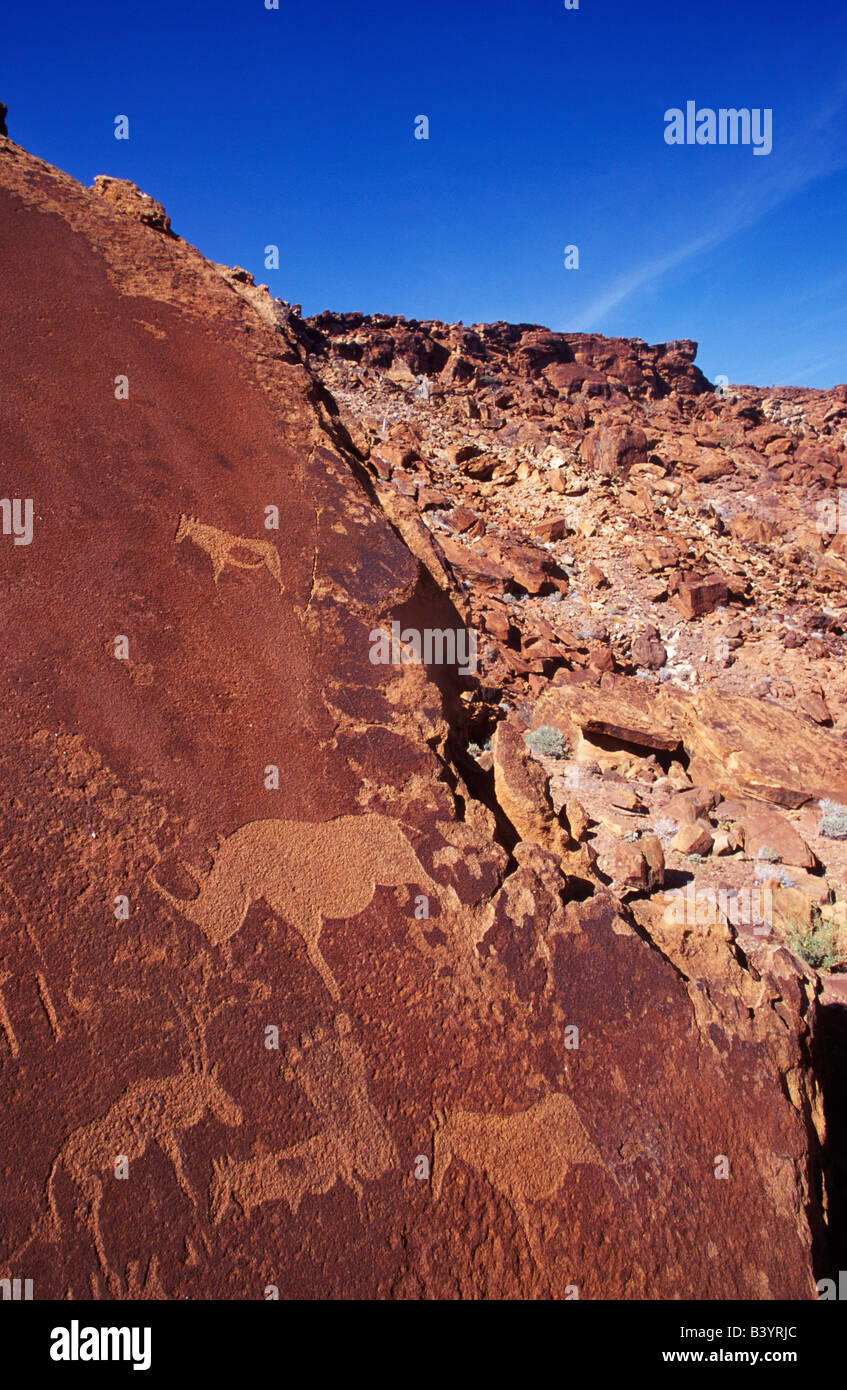 Namibia, Damaraland. Overview of Bushman petroglyphs near caves ...
