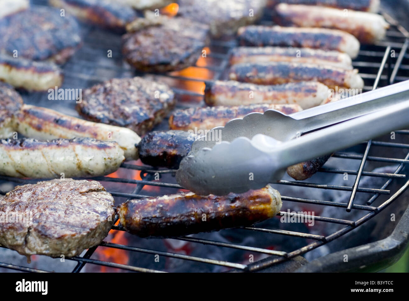 Food being grilled on the barbeque Stock Photo - Alamy