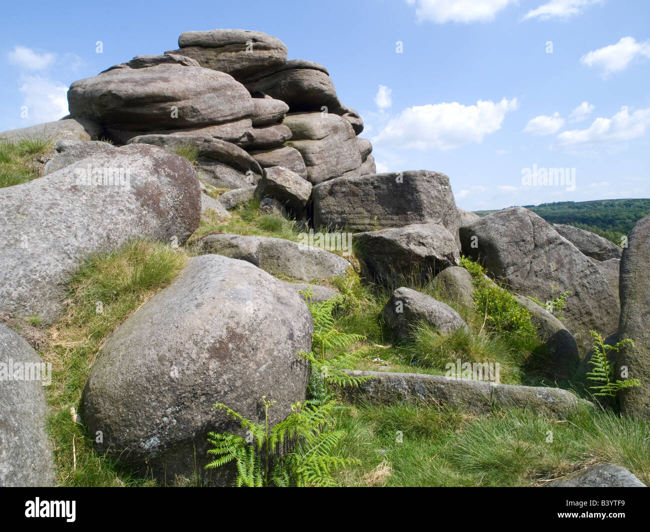A stack of rocks above Padley Gorge in the Peak District National Park ...