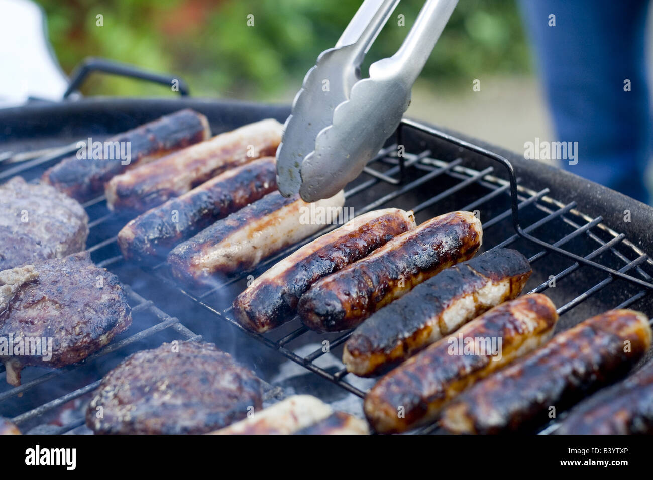 Food being grilled on the barbeque Stock Photo - Alamy