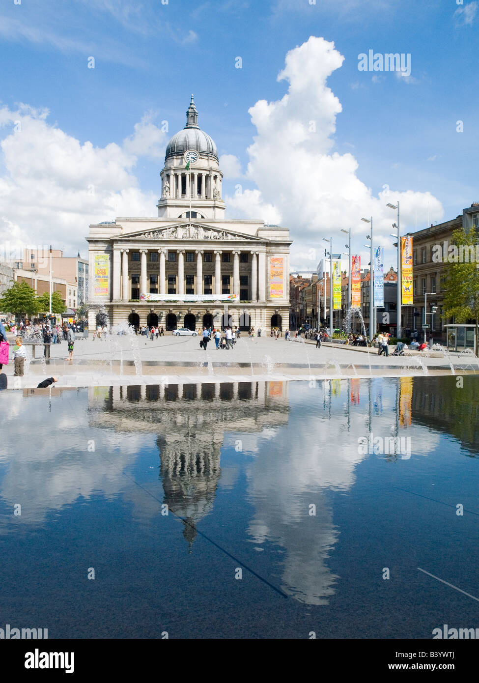 The Council House reflected in the fountains of the Market Square in ...
