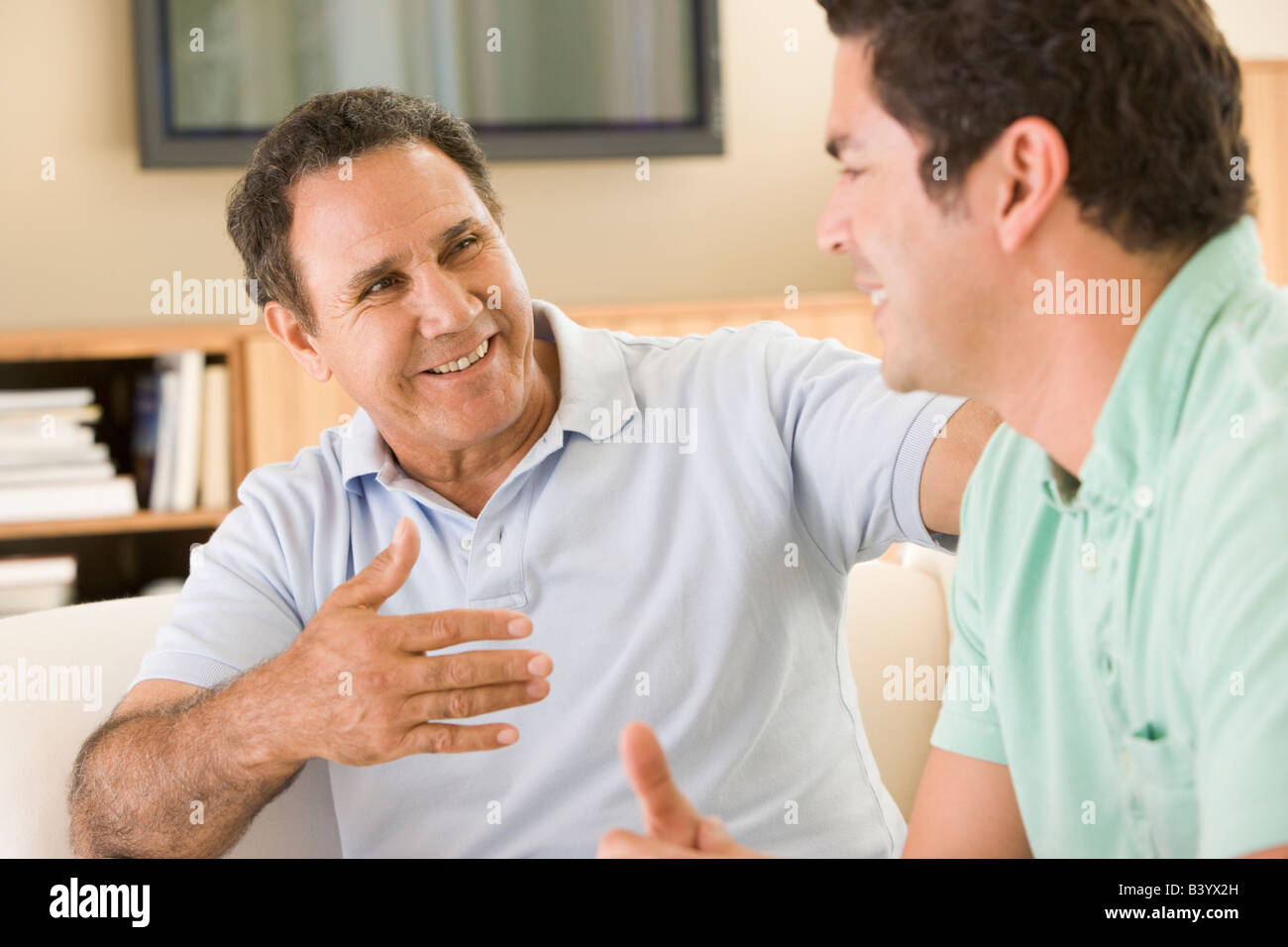 Two men talking home hi-res stock photography and images - Alamy
