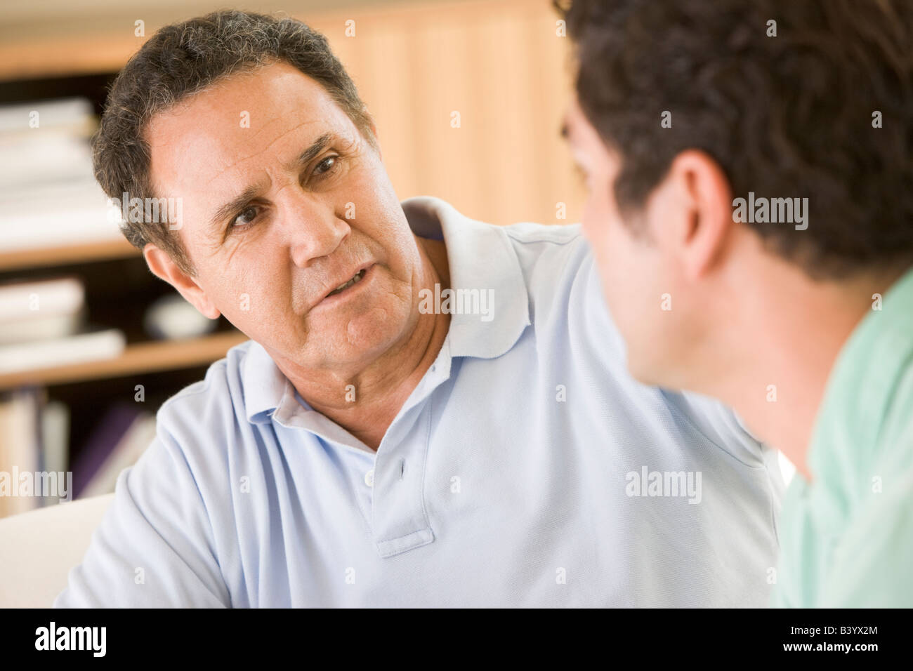 Men discussion home hi-res stock photography and images - Alamy