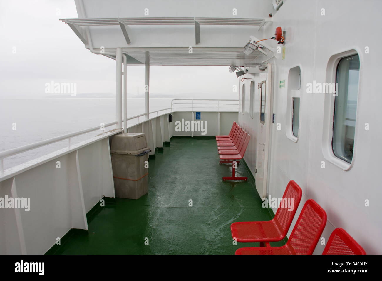 Outside seating on ferry Stock Photo - Alamy