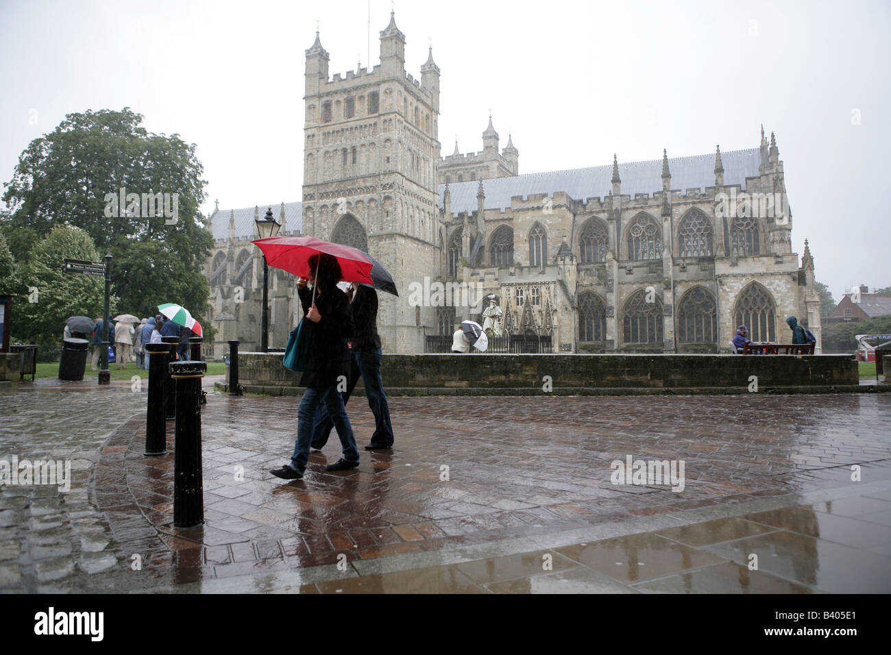 People in Exeter in the rain Stock Photo - Alamy