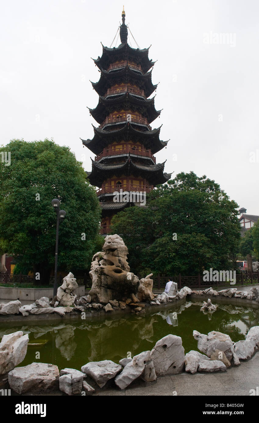 Octagonal pagoda with its upturned eaves by Longhua Temple Stock Photo ...