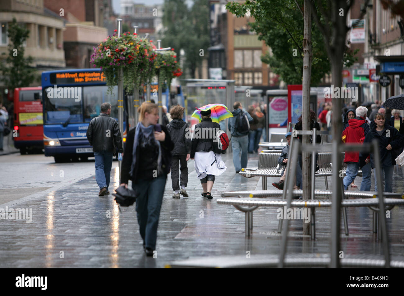 People in Exeter in the rain Stock Photo - Alamy