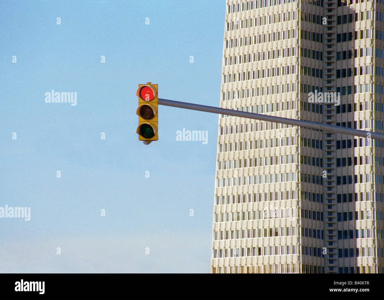 Red traffic light in front of a high-rise building Stock Photo - Alamy