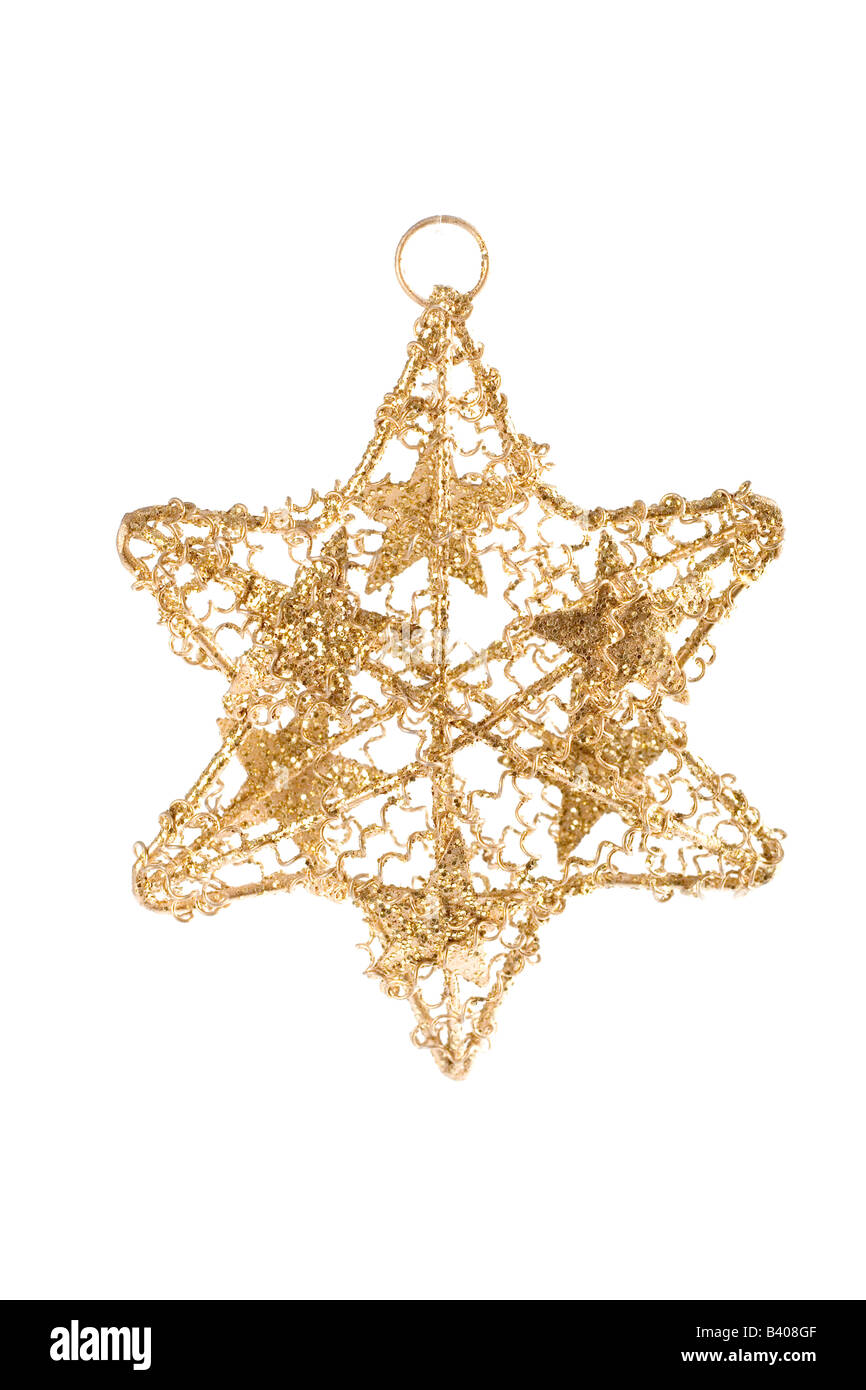 A gold star christmas decoration Stock Photo - Alamy