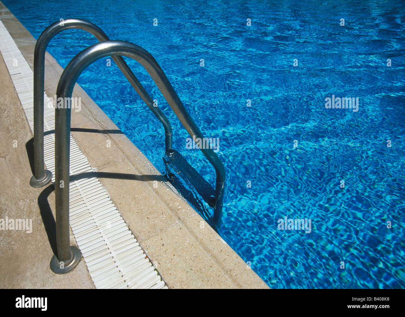 Swimming pool ladder Stock Photo - Alamy