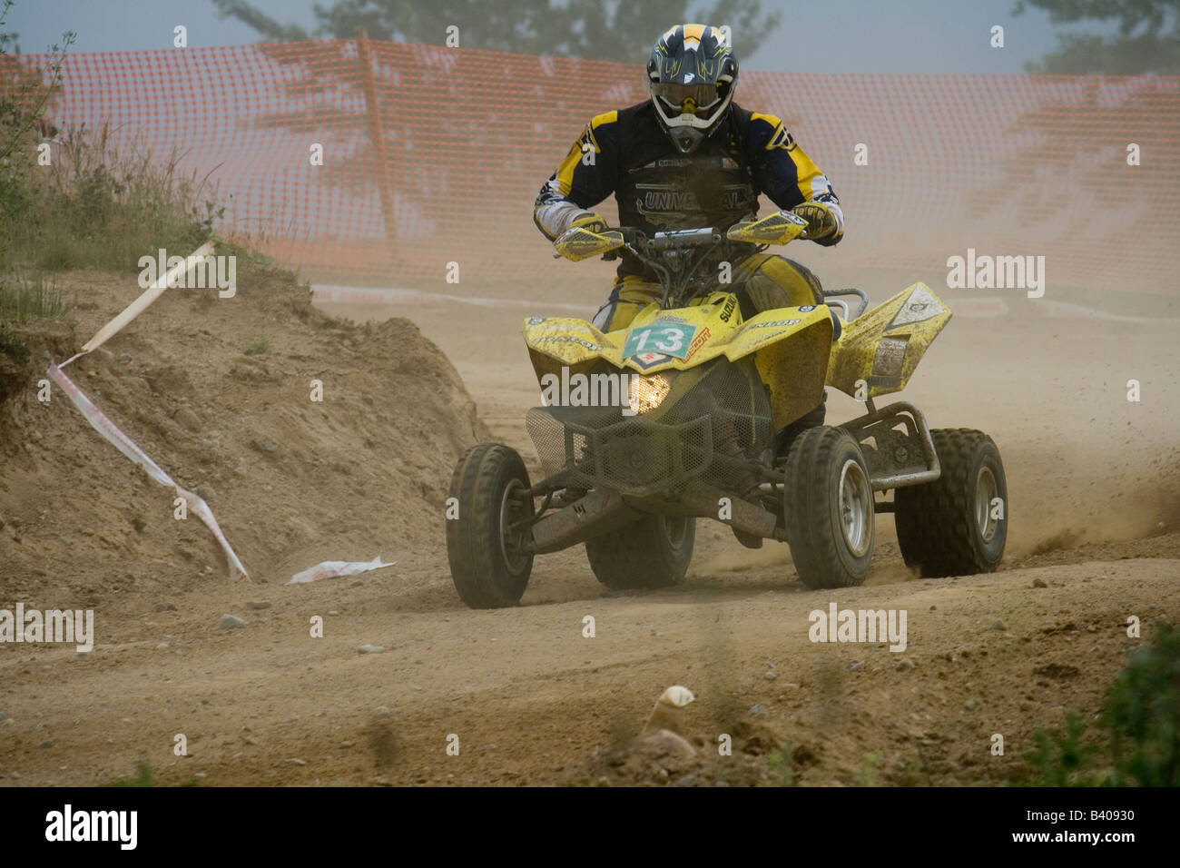 Quad rider during the cross country race Stock Photo - Alamy