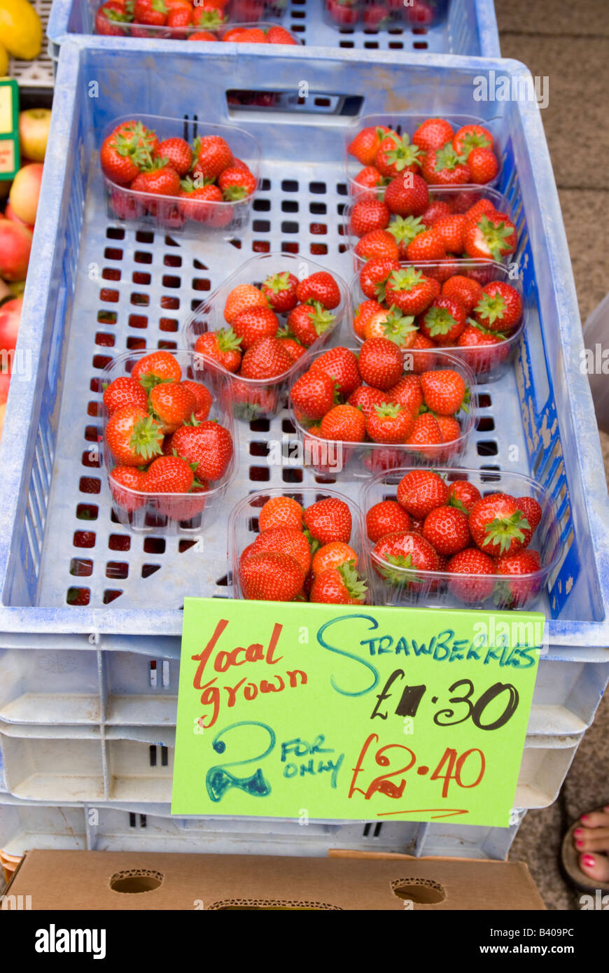 Local grown strawberries for sale outside Uk greengrocers Stock Photo ...