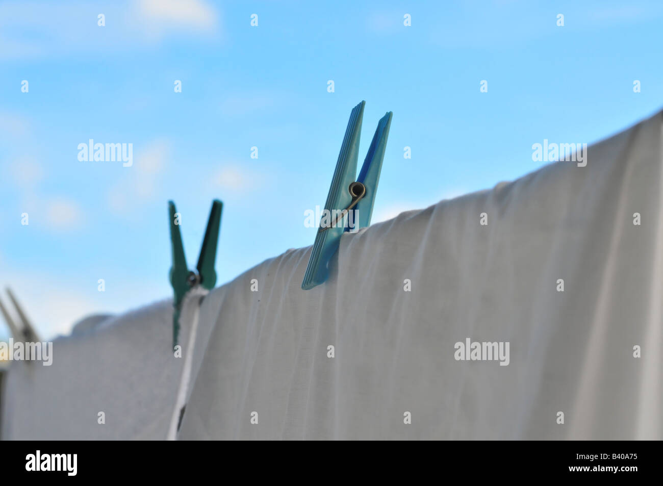 colorful clothing drying in the wind Stock Photo - Alamy