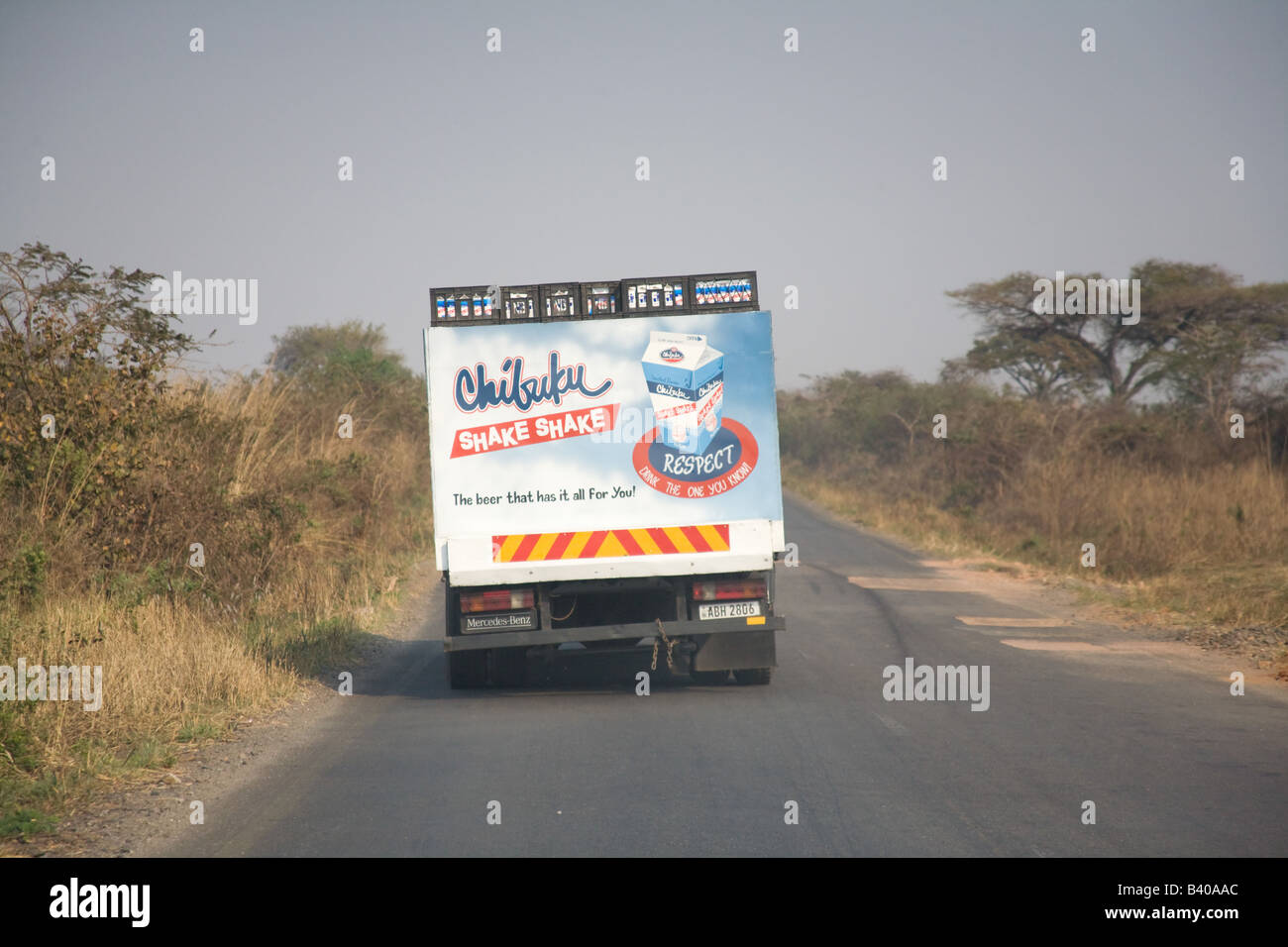 Advert on the back of a truck filled with Chibuku beer, local maize ...