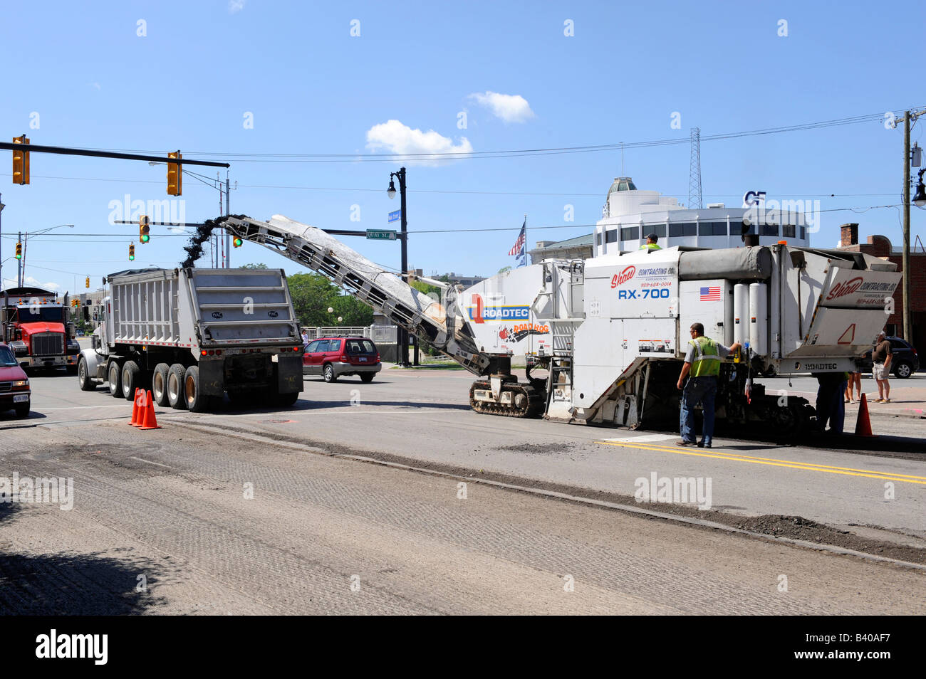 Road asphalt reconstruction using heavy equipment Stock Photo - Alamy