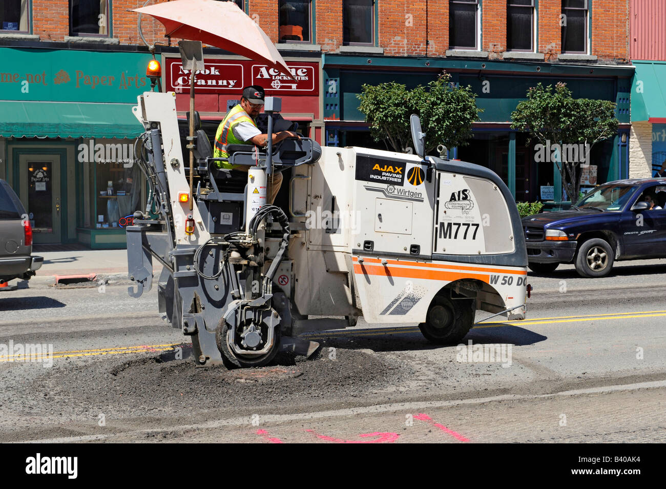 Road asphalt reconstruction using heavy equipment Stock Photo - Alamy