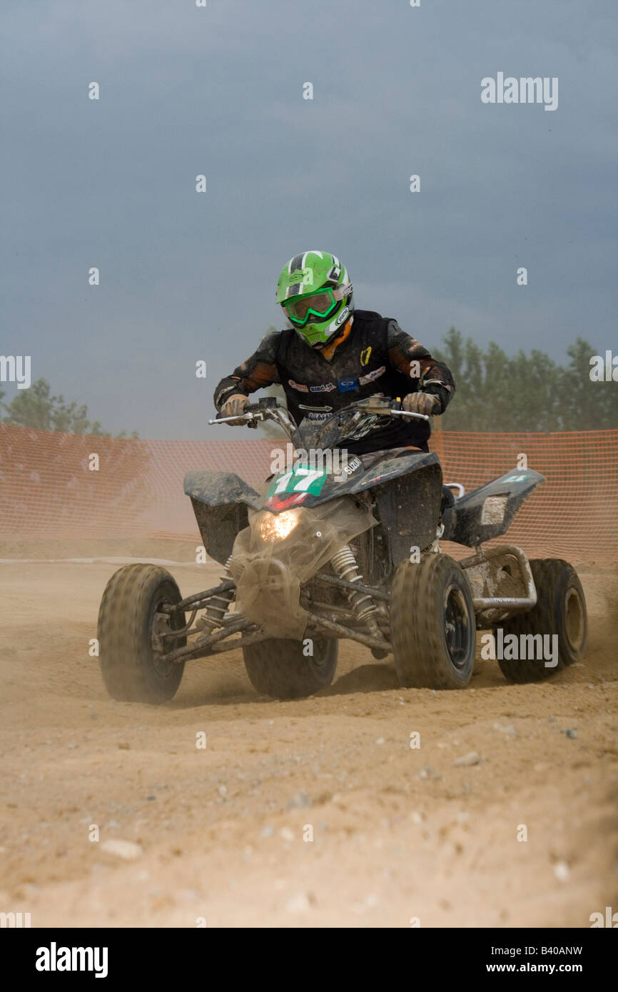 Quad biker during cross country race Stock Photo - Alamy