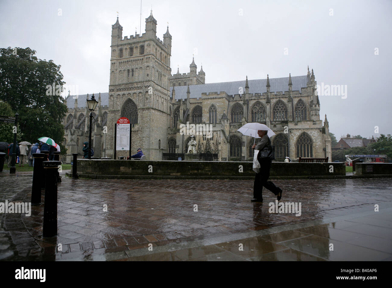 People in Exeter in the rain Stock Photo - Alamy