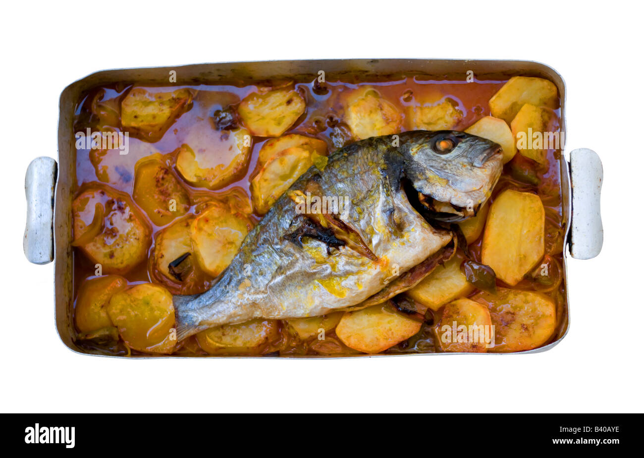 gilthead bream fish roasted in a tray Stock Photo - Alamy