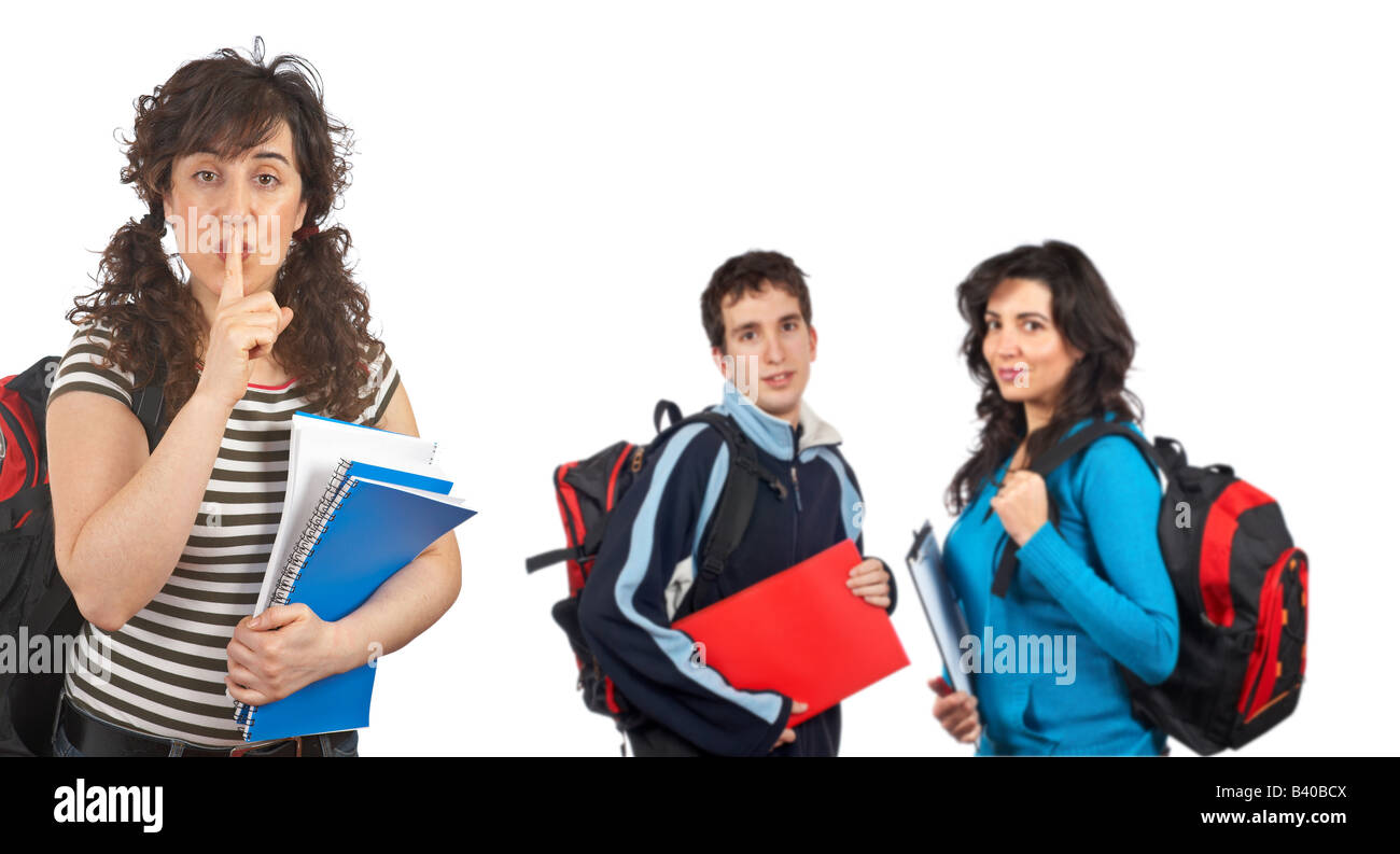 Three students with books and backpacks over a white background Focus ...