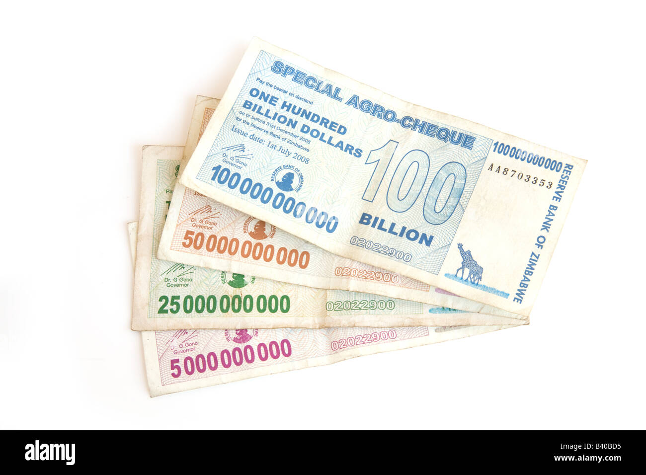Zimbabwean billion dollar notes isolated on a white studio background ...