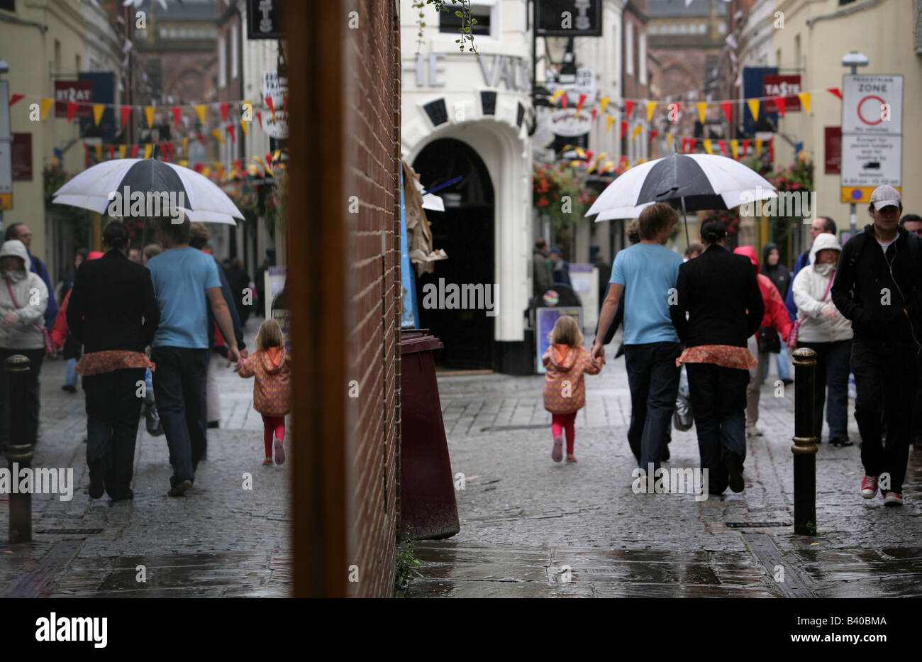 People in Exeter in the rain Stock Photo - Alamy