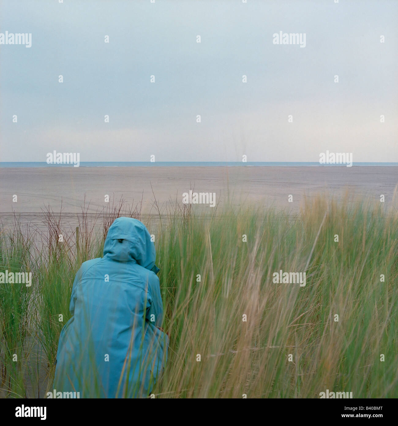 Hiding in adults jacket hi-res stock photography and images - Alamy