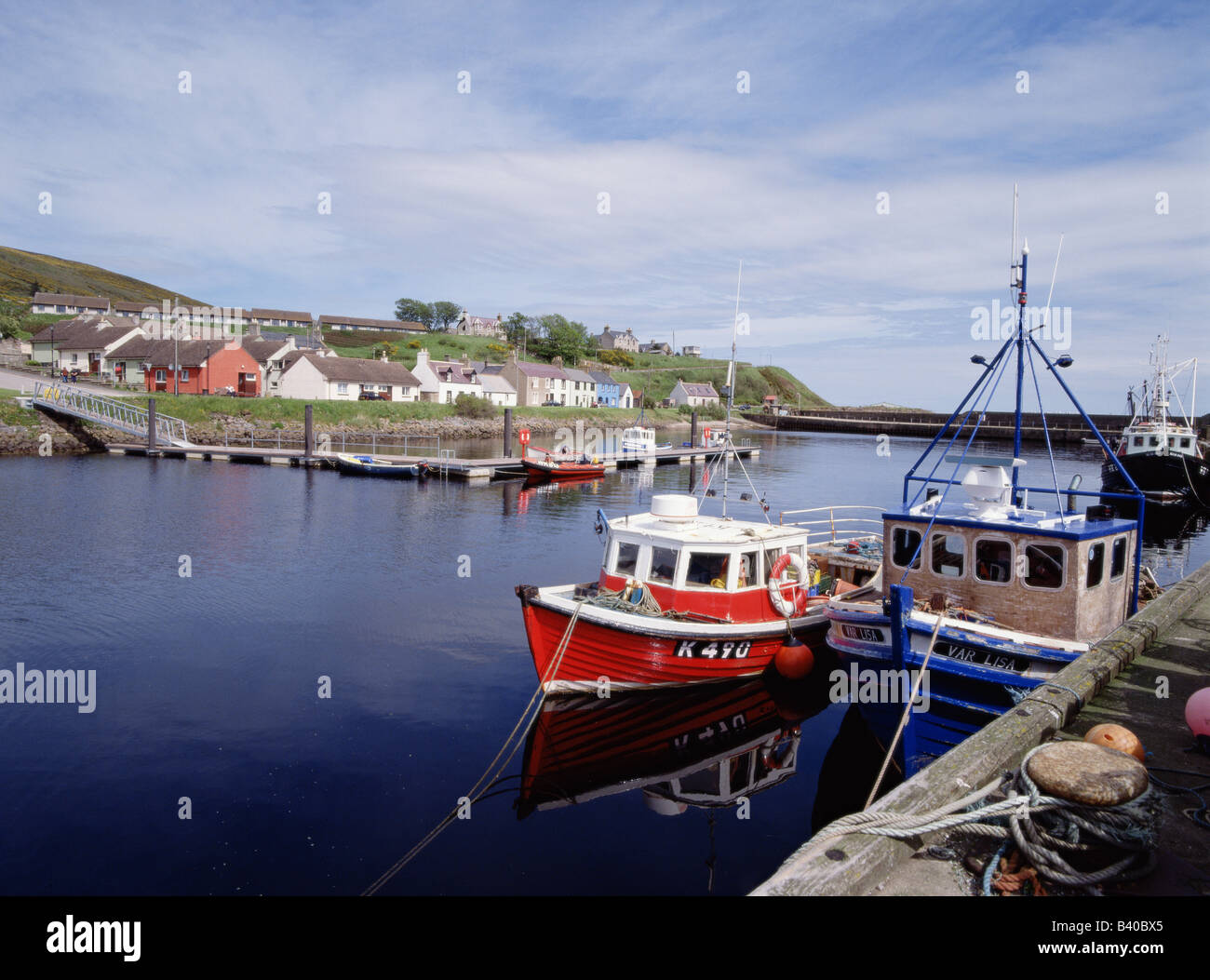 dh Helmsdale harbour HELMSDALE SUTHERLAND Creels and fishing boat at ...