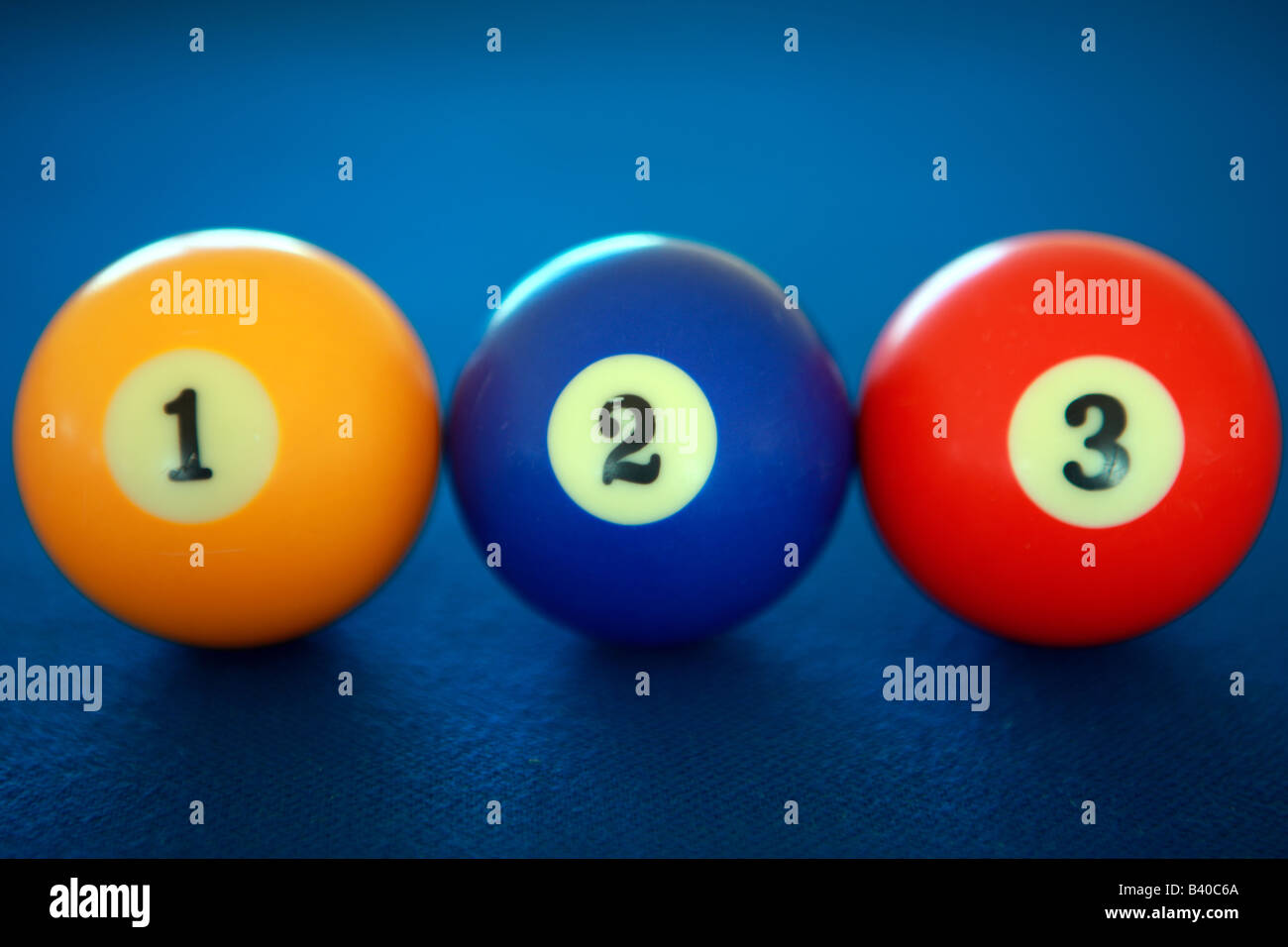 3 Pool balls in a row Stock Photo - Alamy