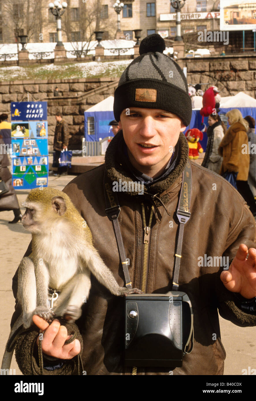 Photographer with a monkey Kiev Ukraine Stock Photo - Alamy