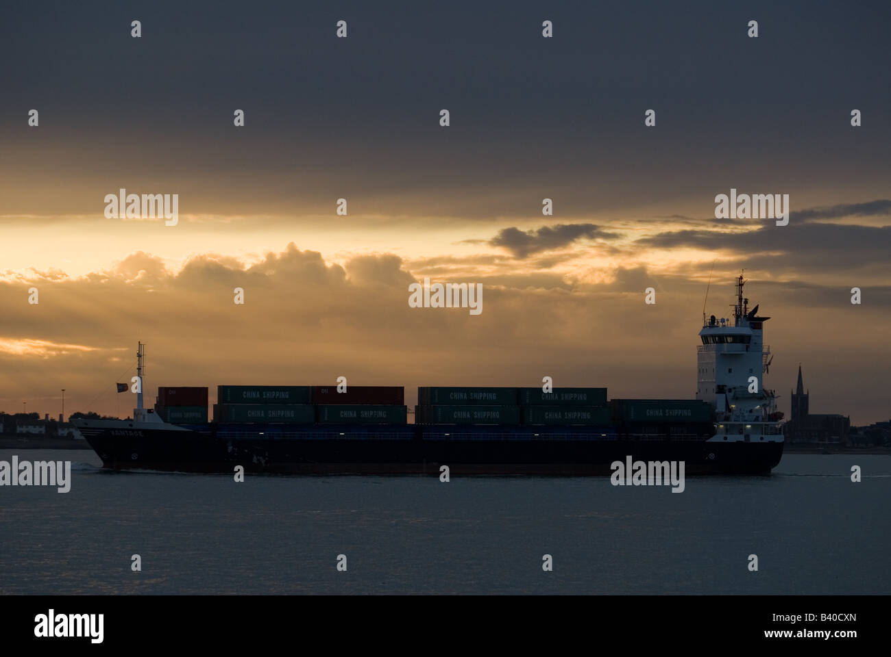 Container ship 'Vantage' leaving the port of Harwich, Essex, UK Stock ...