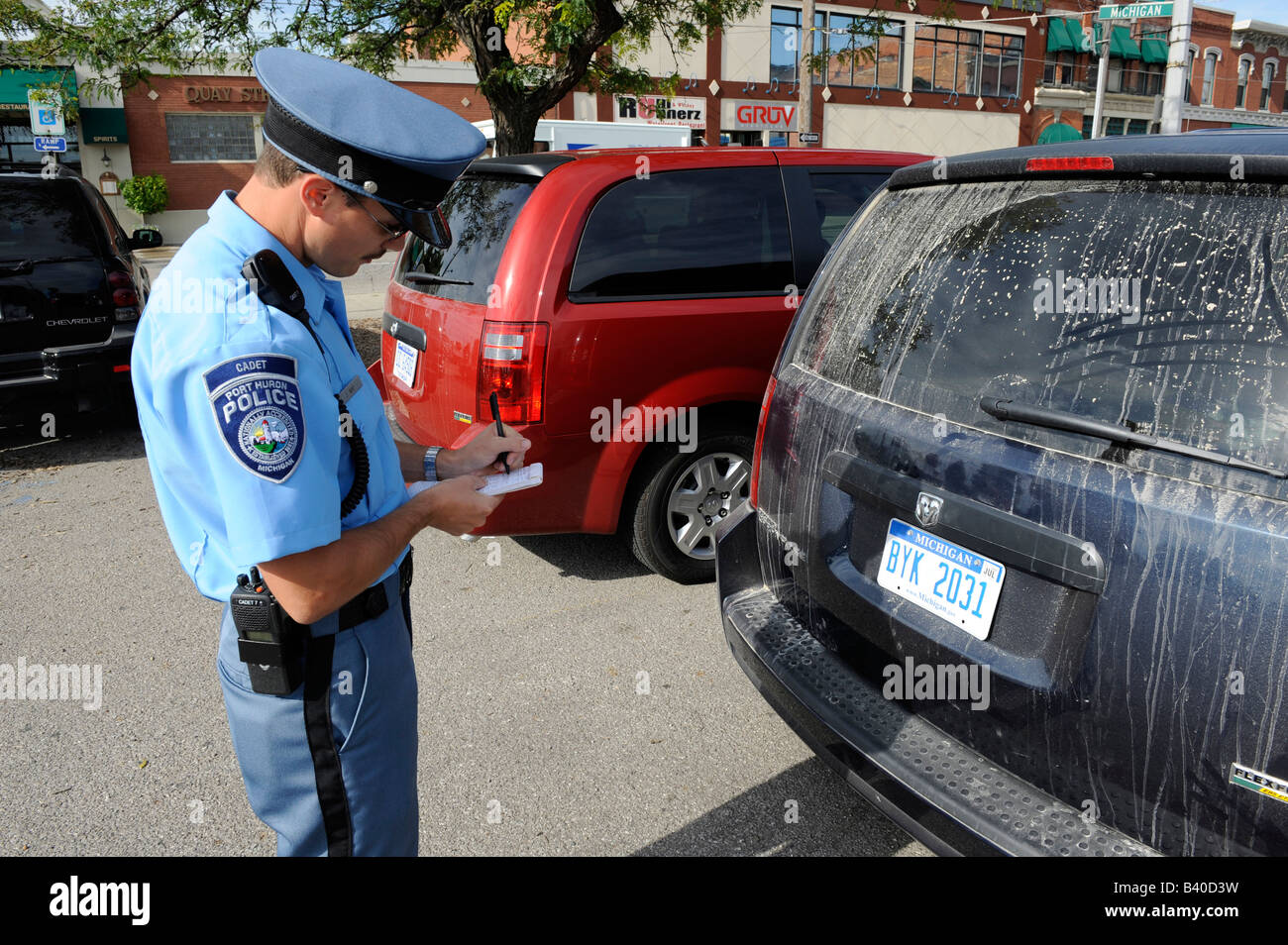 Police issuing parking ticket hi-res stock photography and images - Alamy