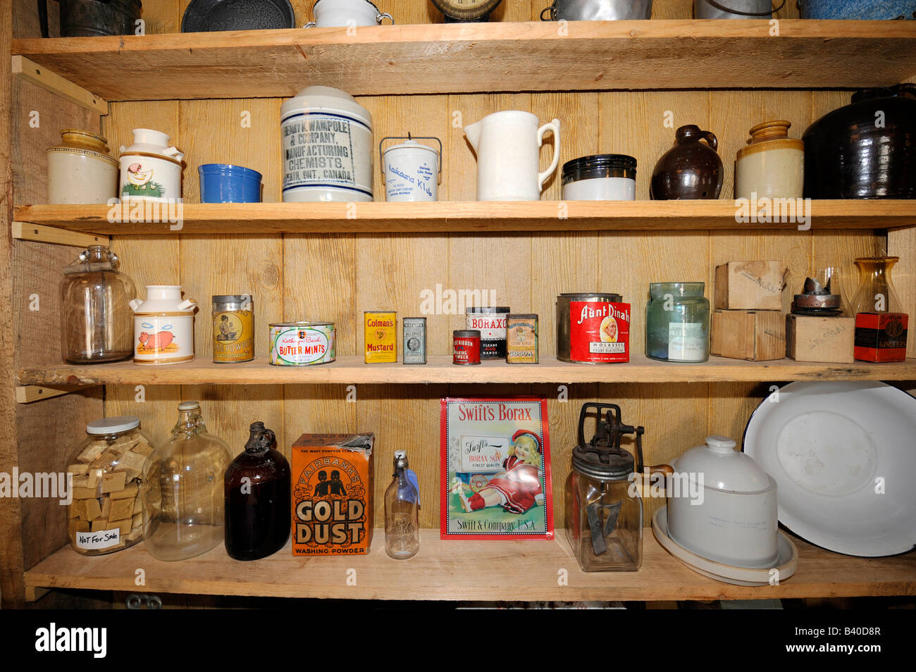 Antique products on the shelf of a historical general store setting ...