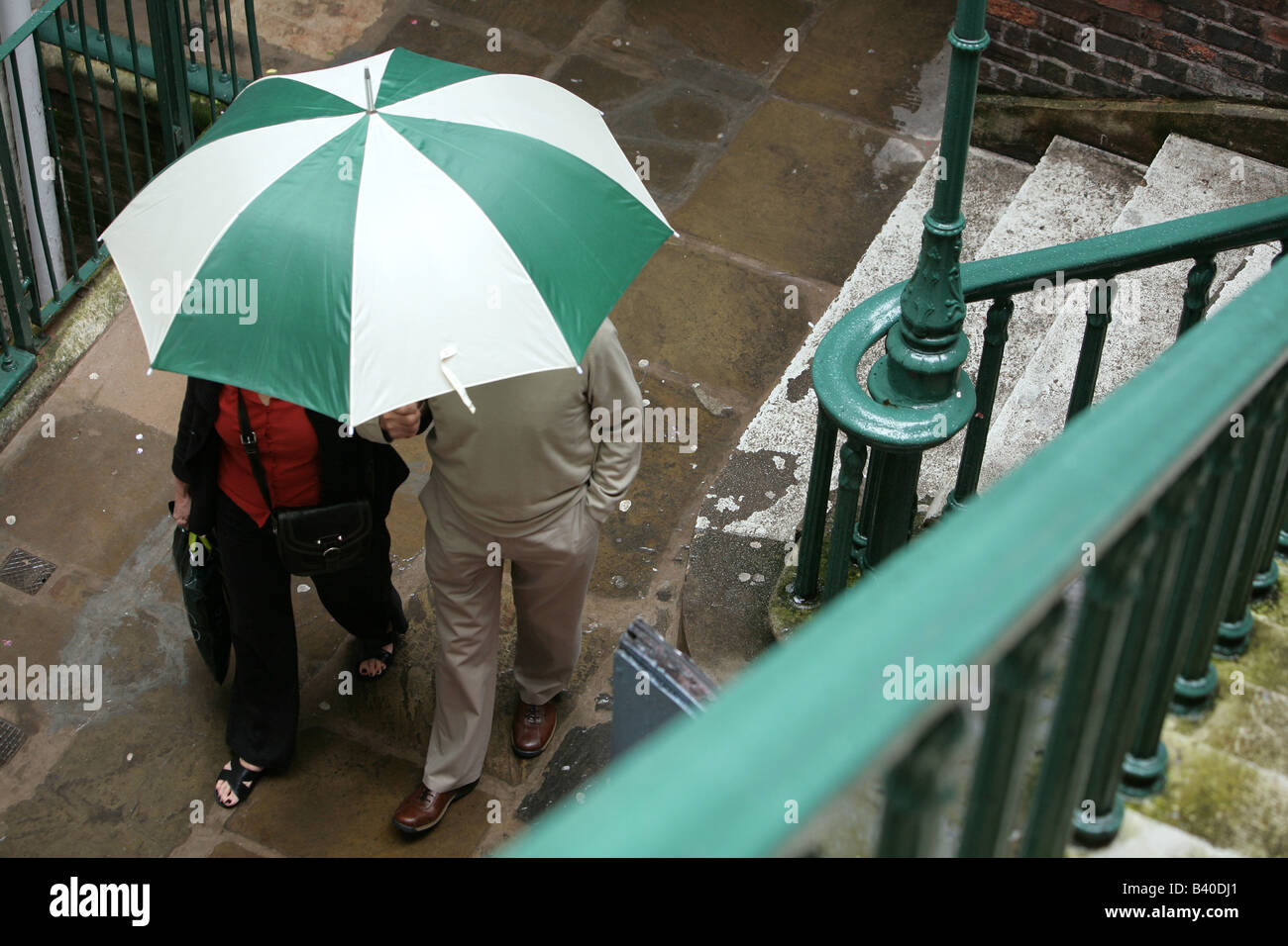 People in Exeter in the rain Stock Photo - Alamy