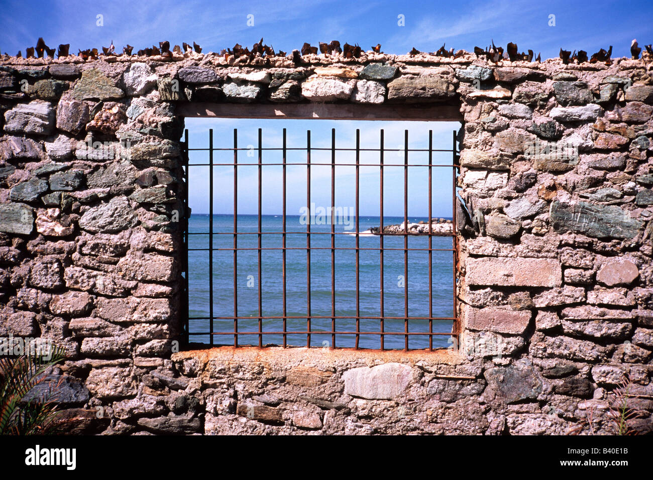 Wall by the ocean Stock Photo - Alamy