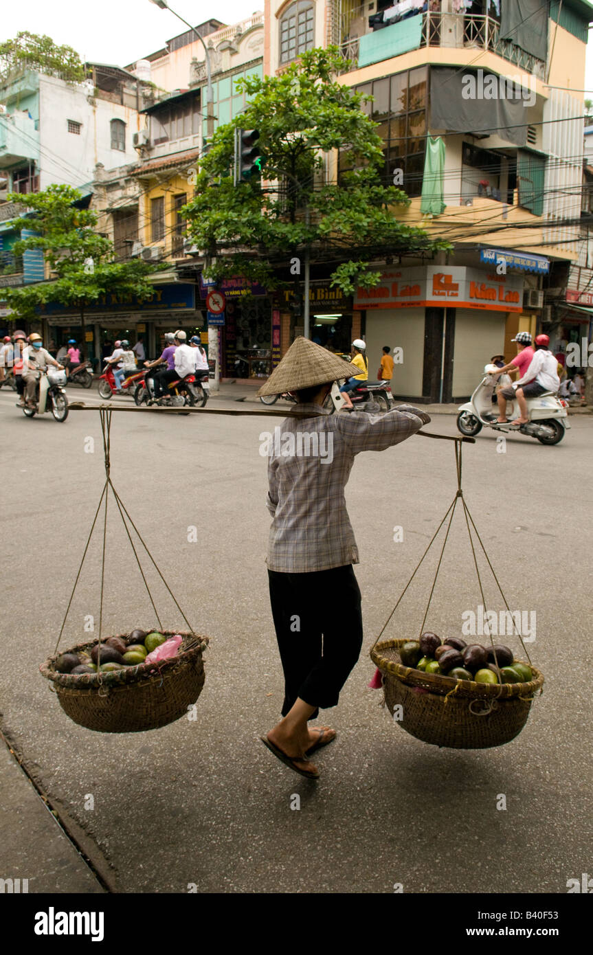 Hanoi shoulder pole hi-res stock photography and images - Alamy