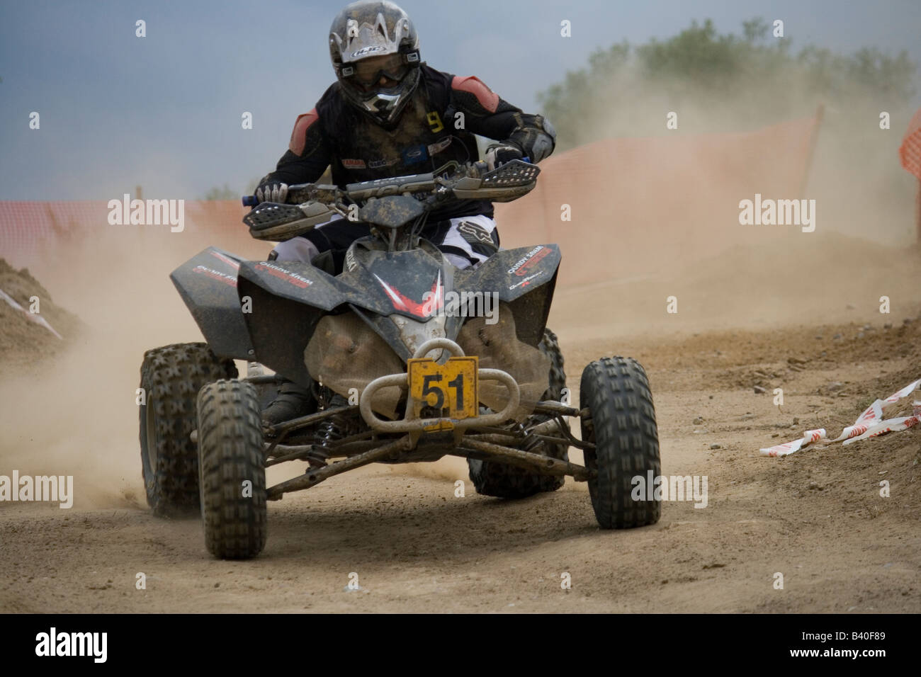 Quad rider during the cross country race Stock Photo - Alamy