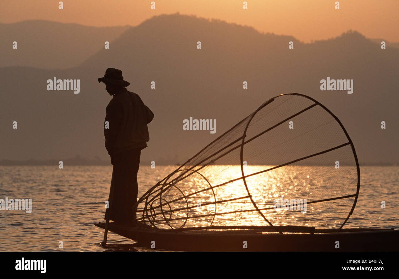 Intha fisherman at sunset on Inle Lake in Myanmar Stock Photo - Alamy