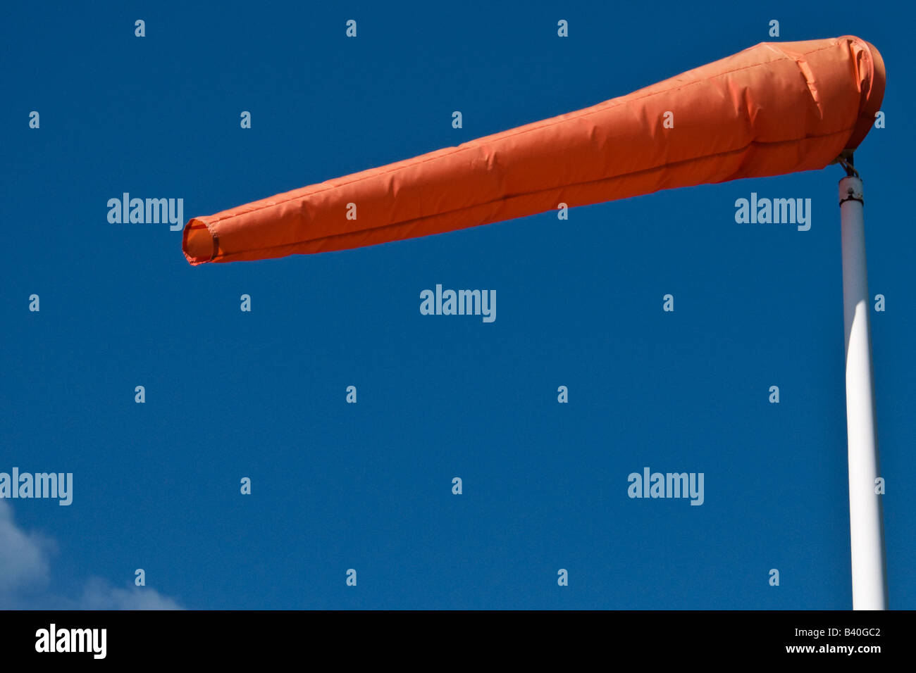 A colour photograph of an orange windsock Stock Photo - Alamy