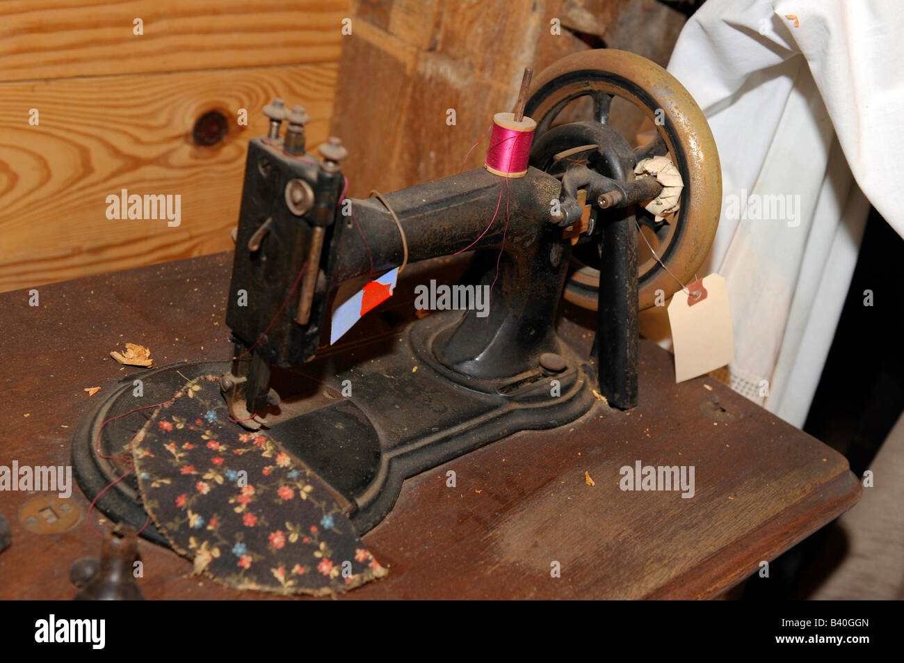 Old antique foot driven sewing machine Stock Photo - Alamy