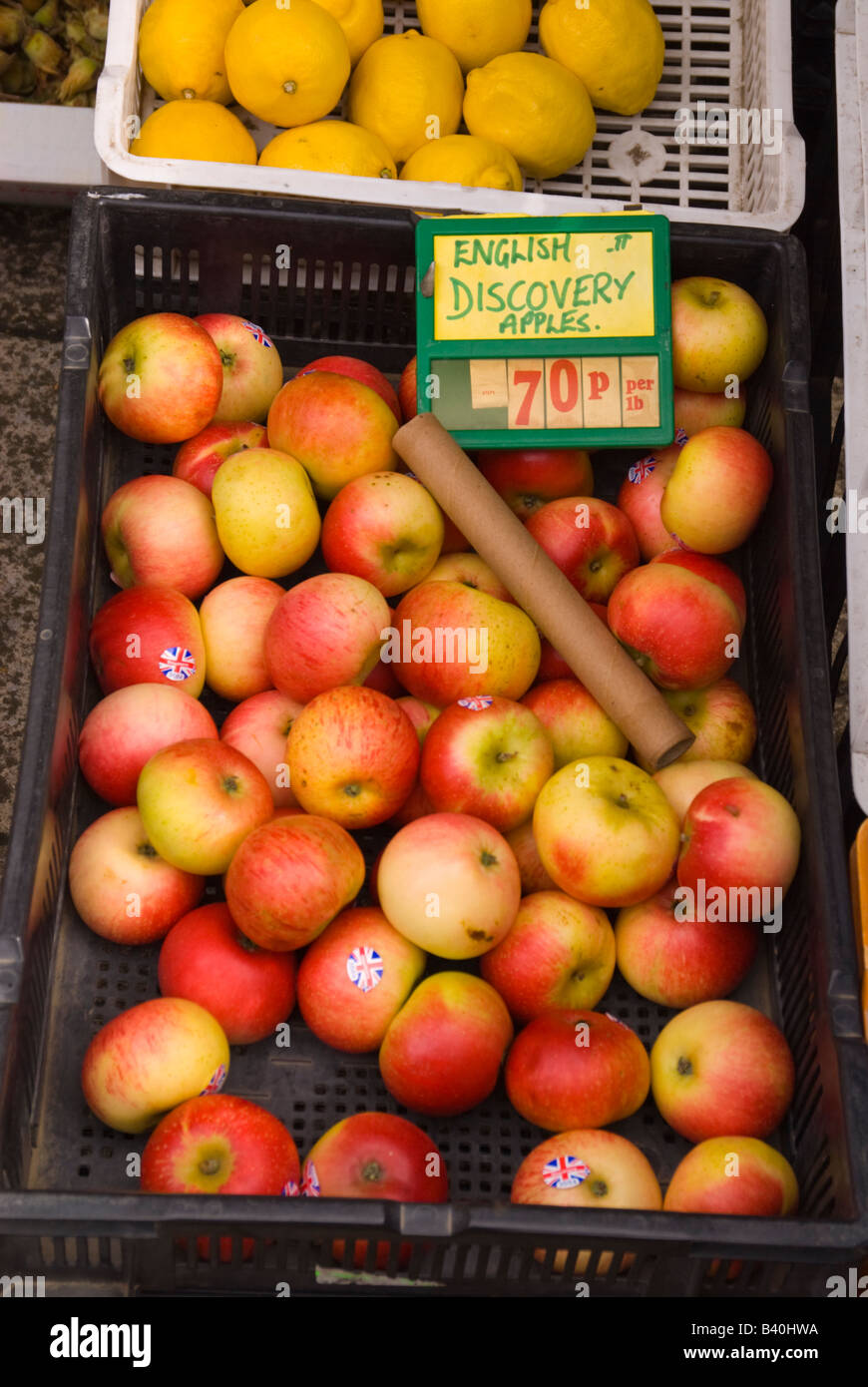 Discovery apples for sale outside Uk greengrocers Stock Photo - Alamy