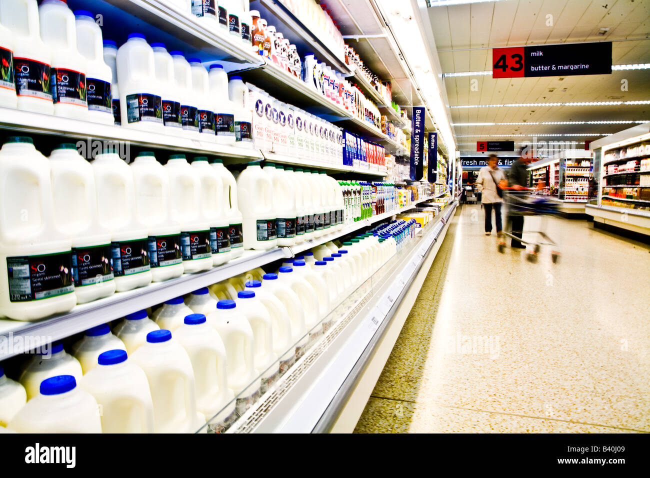 Buying Dairy products in a Supermarket Stock Photo - Alamy