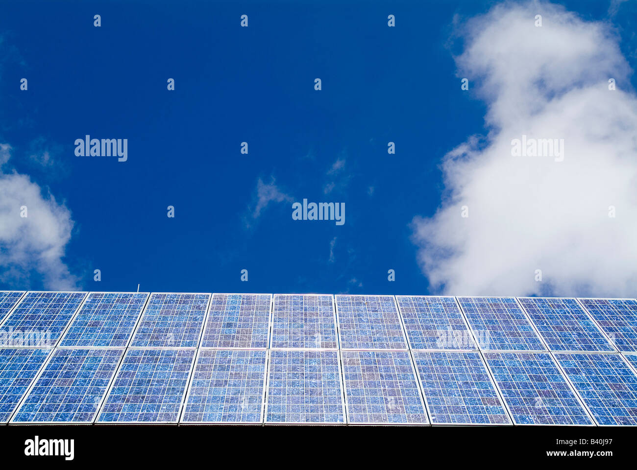 Solar Cells and sky with clouds Stock Photo - Alamy