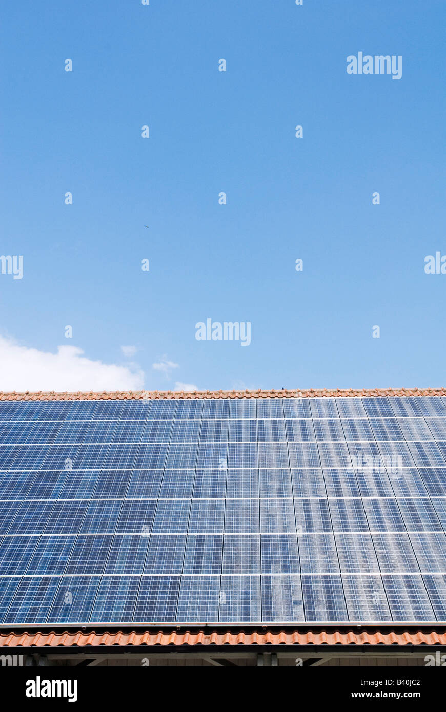 Solar Cells and sky with clouds Stock Photo - Alamy