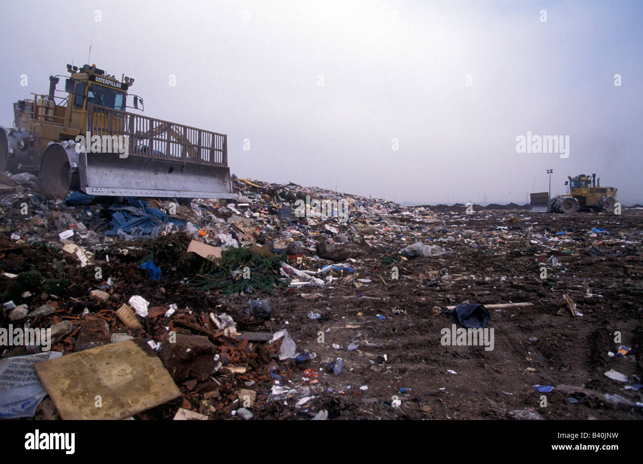 Digger working at landfill site hi-res stock photography and images - Alamy