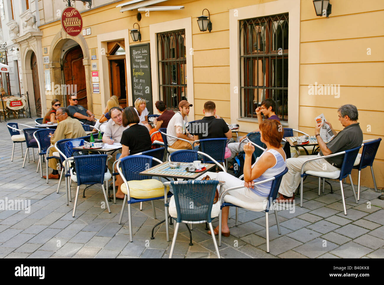 People sitting in cafe hi-res stock photography and images - Alamy