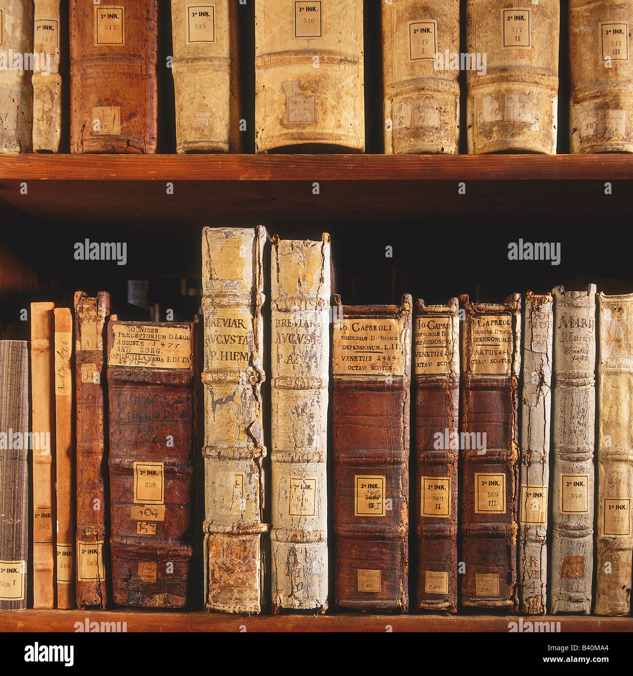 Old books on shelf Stock Photo - Alamy